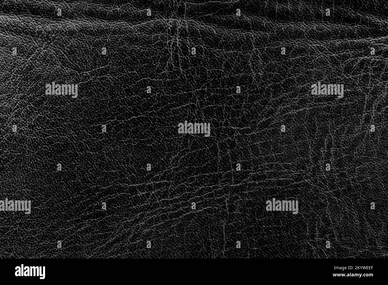 Black leather texture. Abstract background of dark leather with small ...