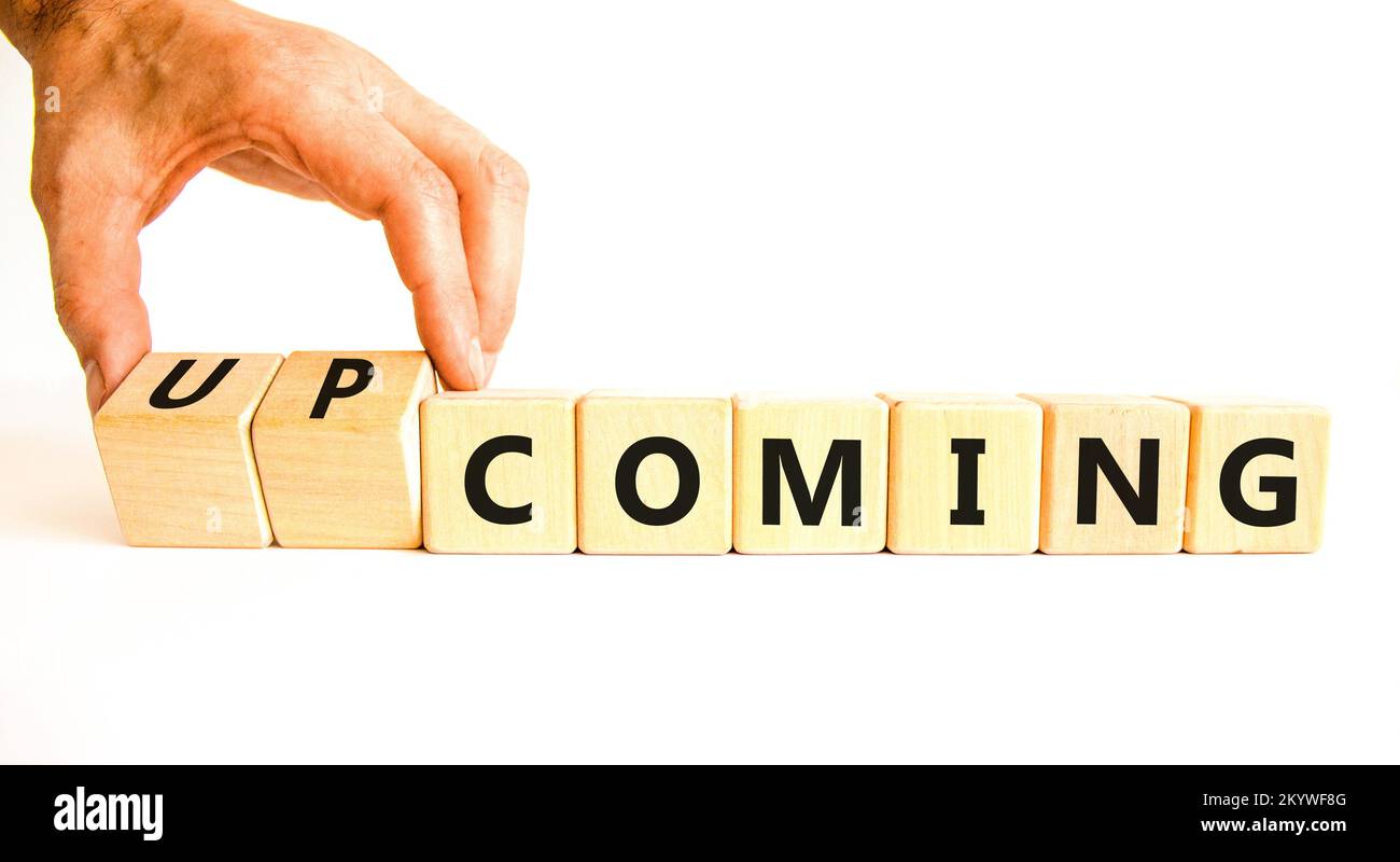 Coming or upcoming symbol. Concept words Coming and Upcoming on wooden ...