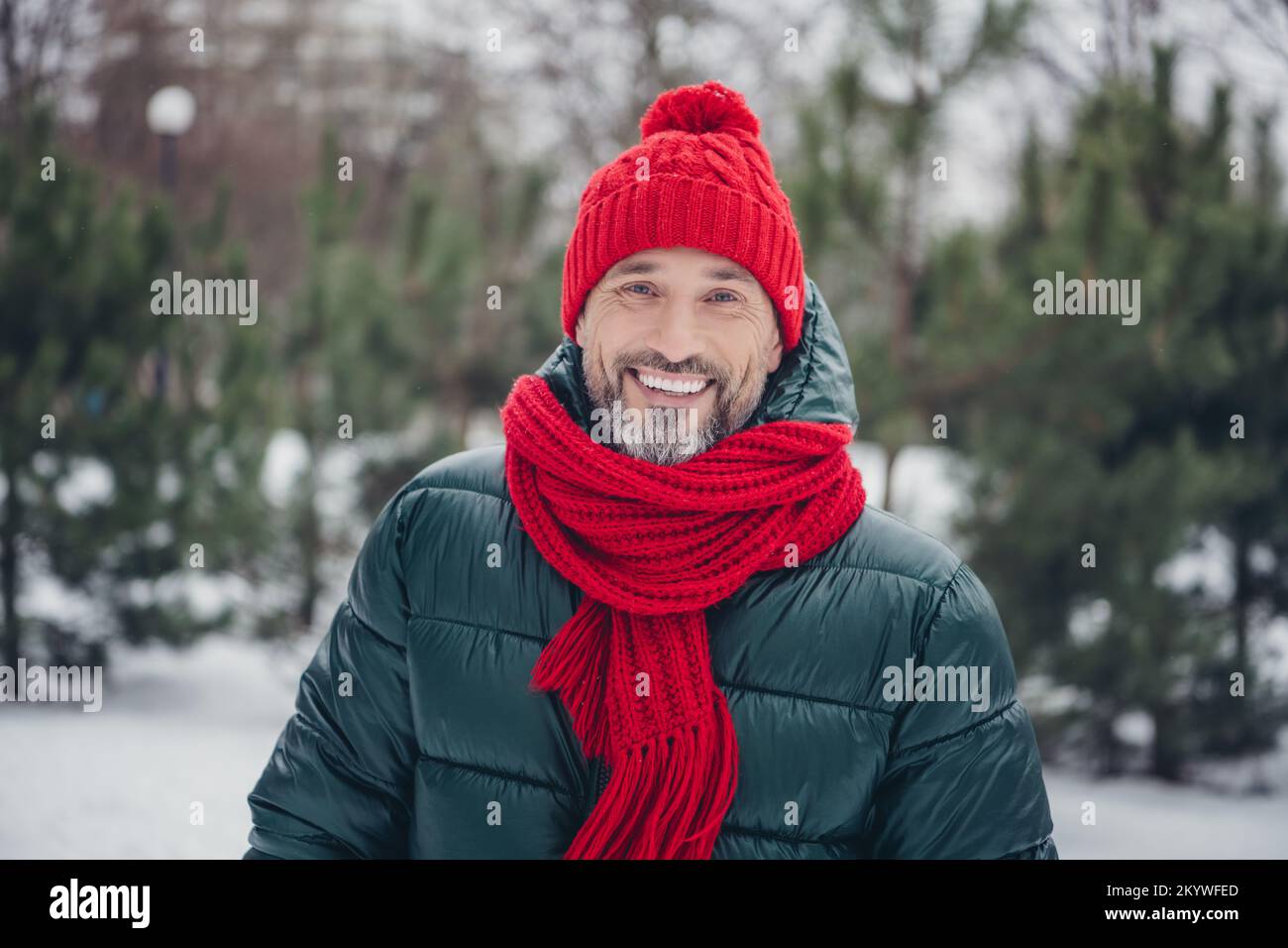 Photo of funny handsome middle age guy wear windbreaker smiling walking ...