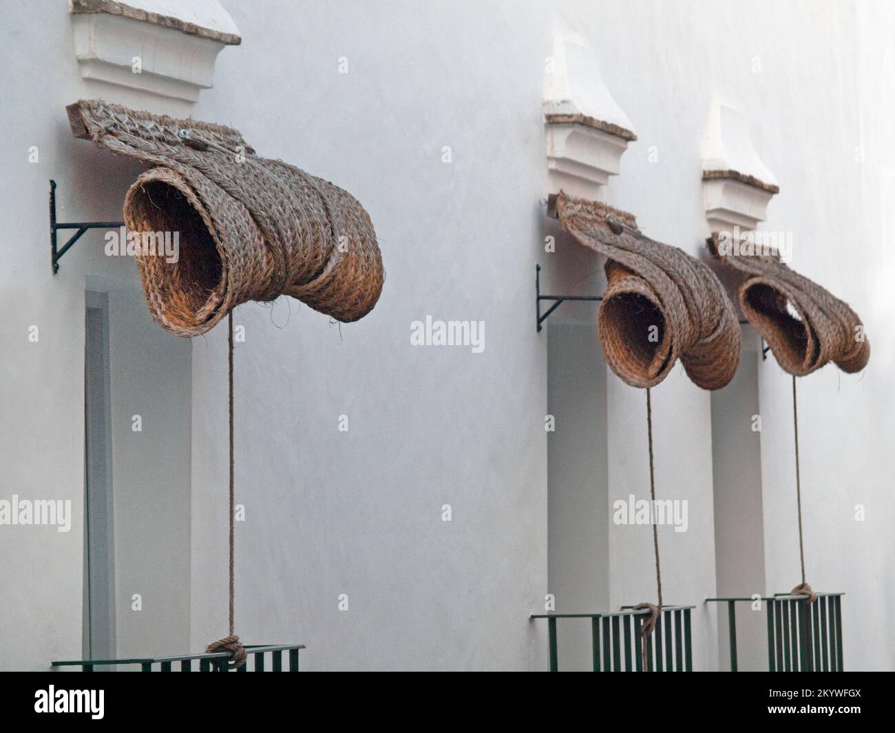 Woven sun blockers on windows in southern Spain Stock Photo - Alamy