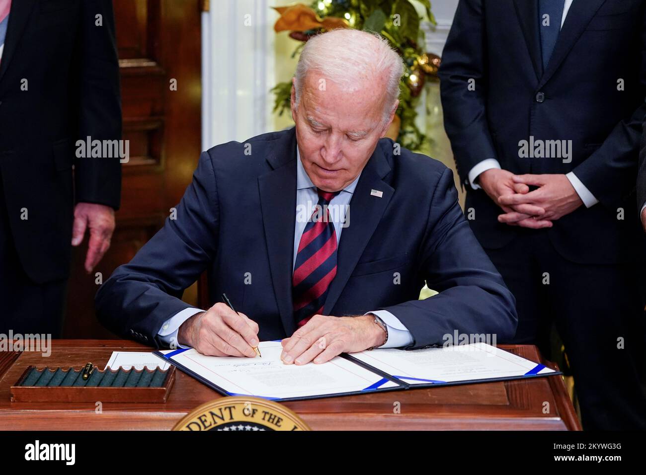 US President Joe Biden signs H.J.Res.100, providing a resolution to ...