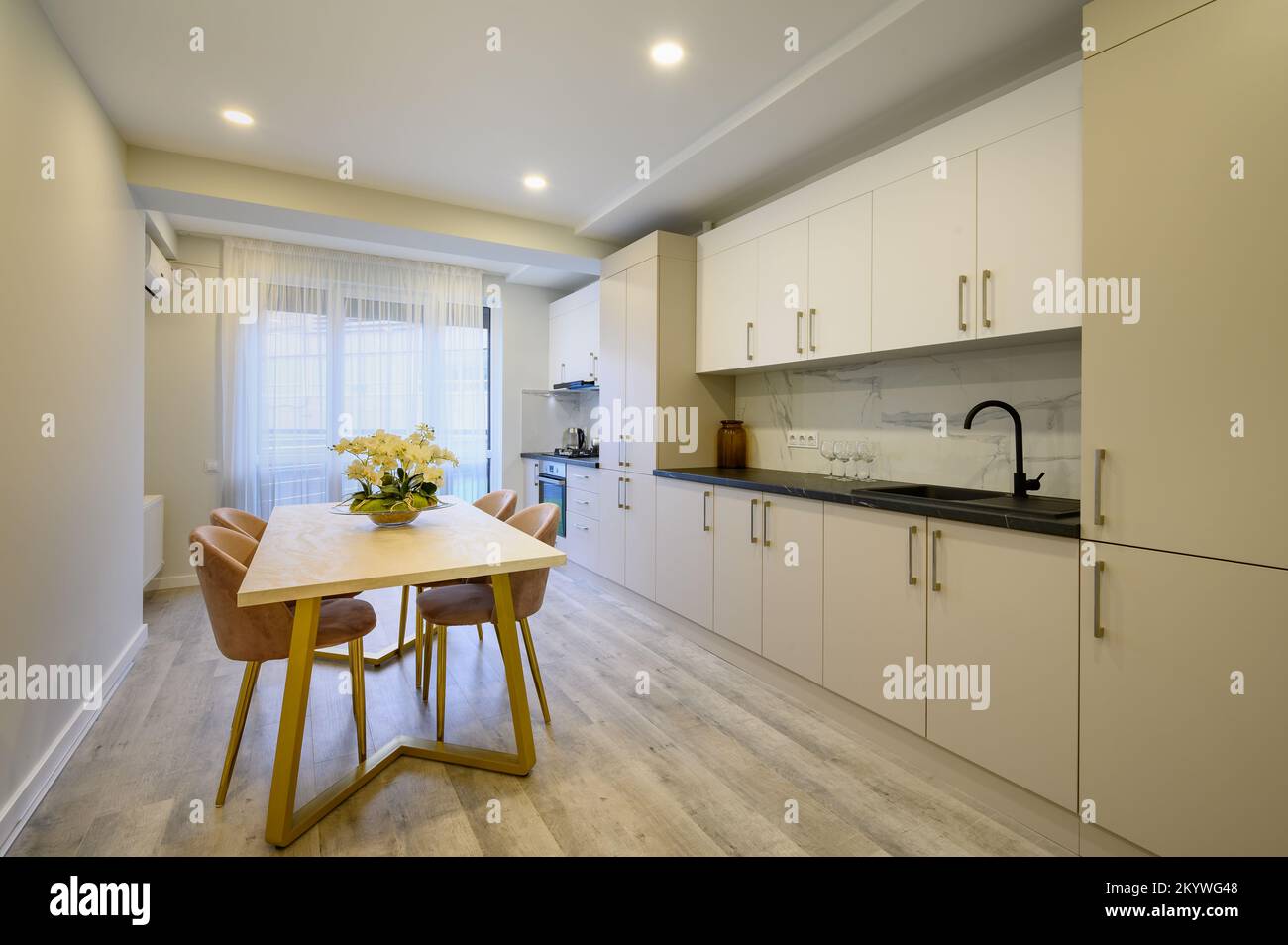 Large beige and cream luxury kitchen interior Stock Photo - Alamy