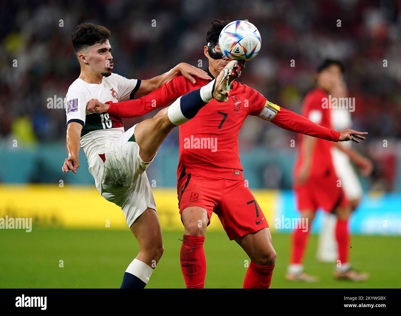 Portugals Vitinha Left And South Koreas Son Heung Min Battle For