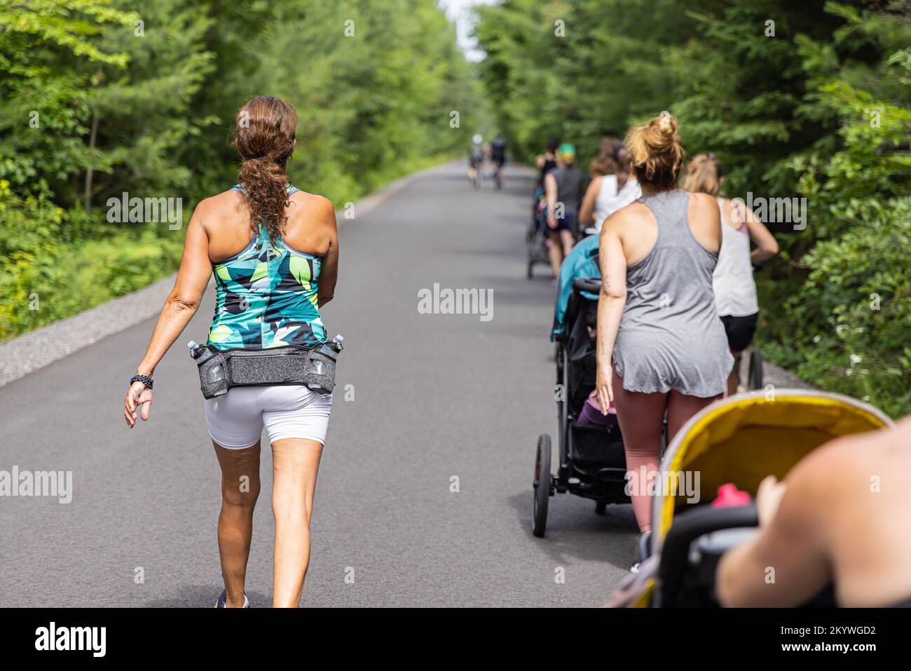 On the left is an instructor giving cardio and aerobic instructions to ...