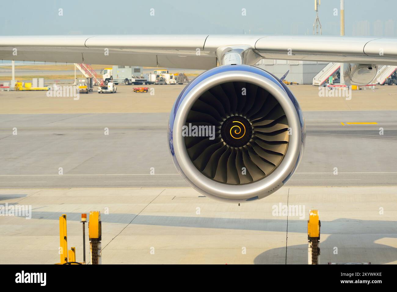 Part of wing and engine of modern jet flight Stock Photo - Alamy