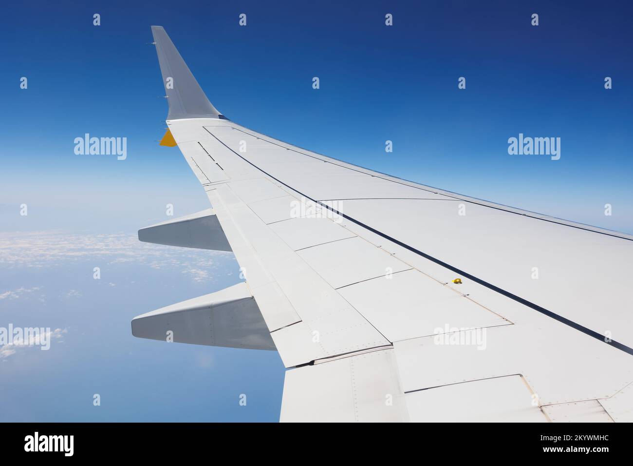 View from Inside an Aircraft: Window of the Cabin, White Airplane Wing ...