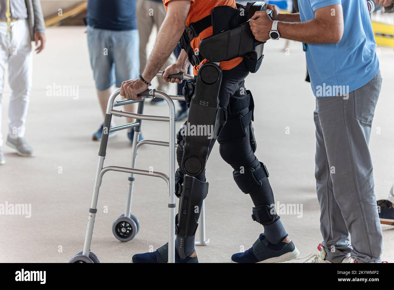 Boy with Mobility Problems in Lower Limbs in Upright Posture Walking ...