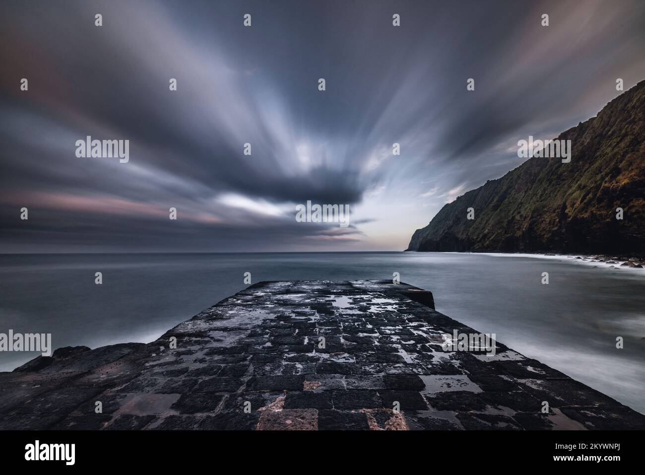 striking ocean scenery long exposure with jetty, Azores Stock Photo - Alamy