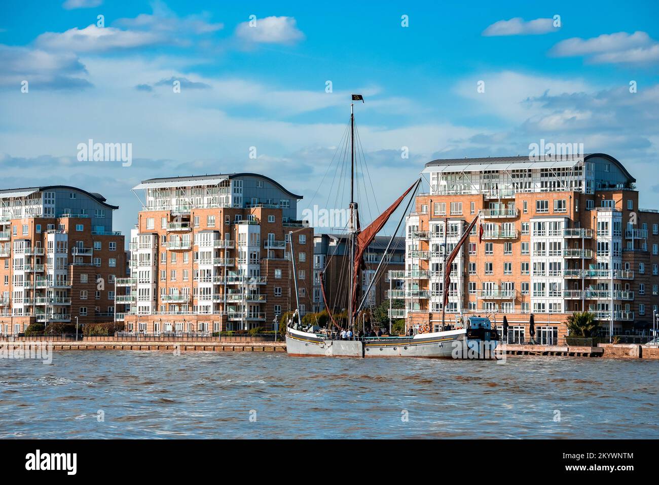 Boats and small ships docked on a river Thames in London, UK Stock ...