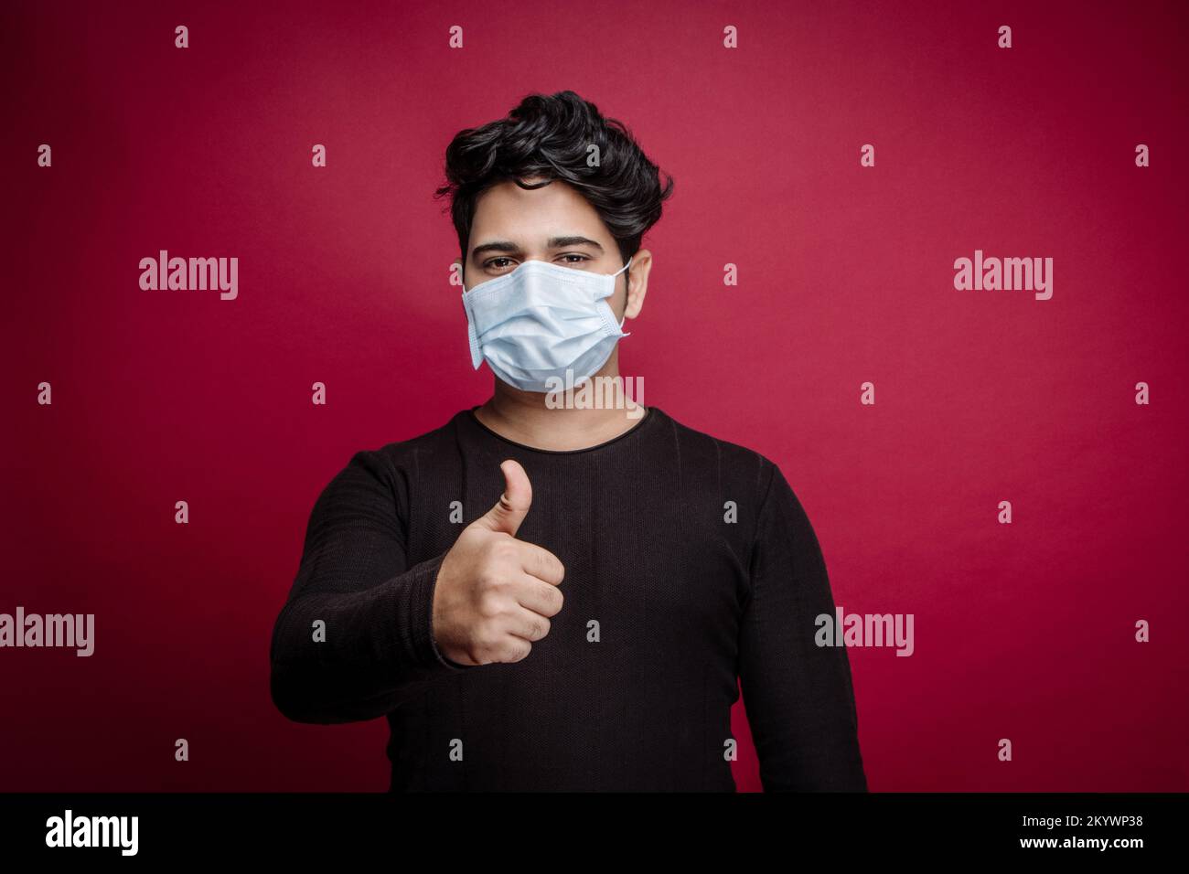Man face mask thumbs up hi-res stock photography and images - Alamy
