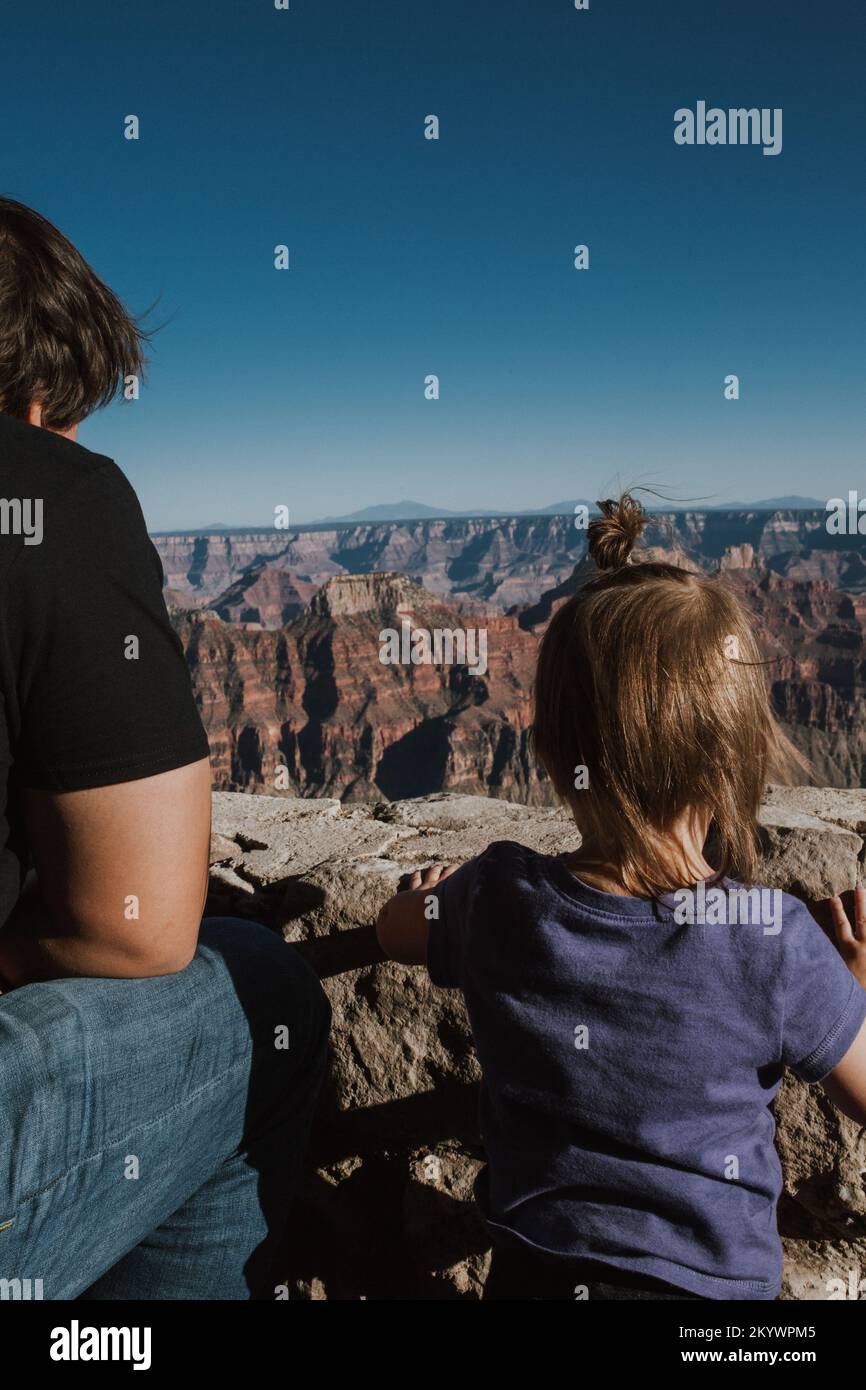Native American father and toddler daughter looking over the gra Stock ...