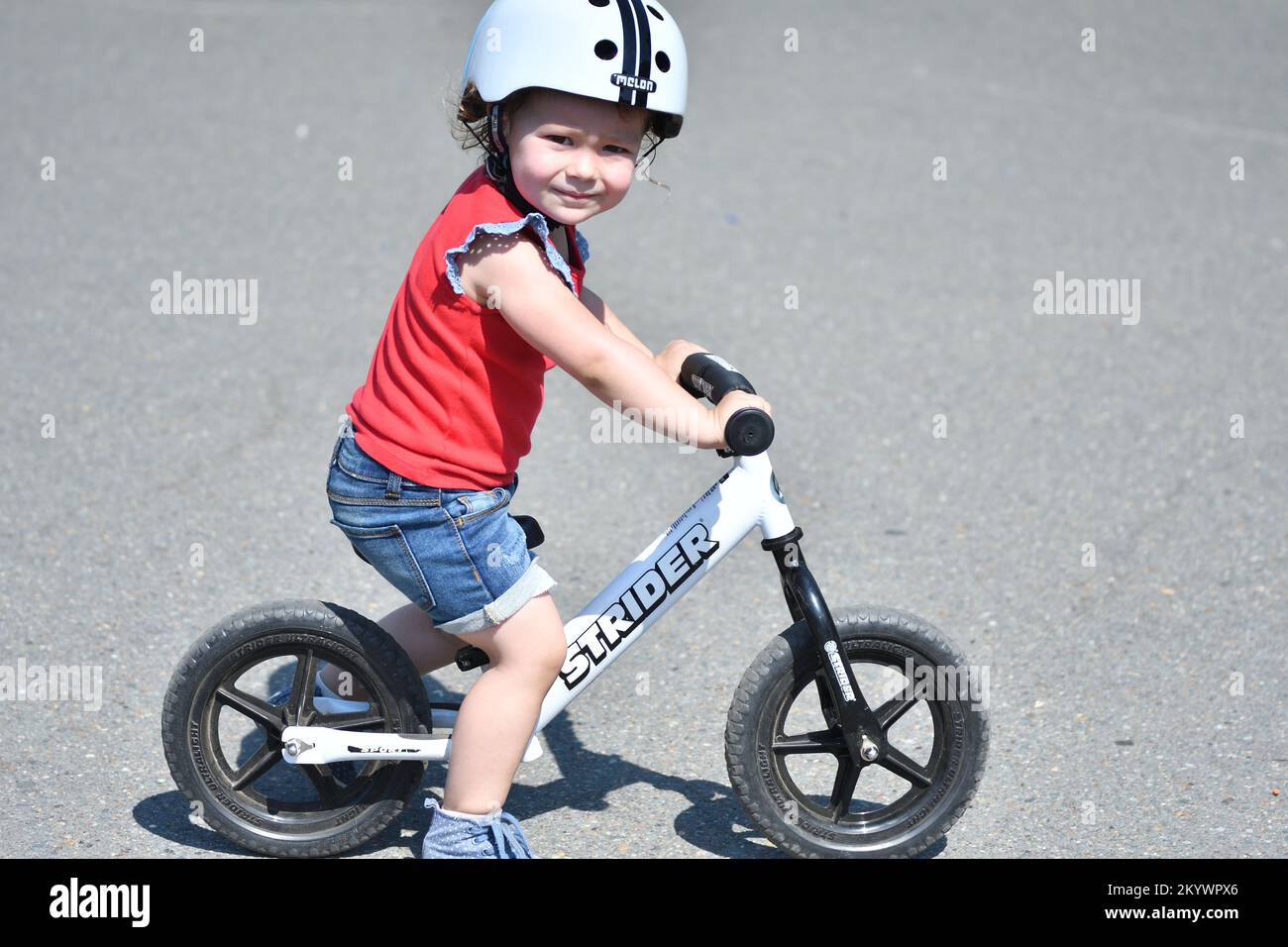 Orenburg, Russia - July 29, 2017 year: little kids learn to ride on ...