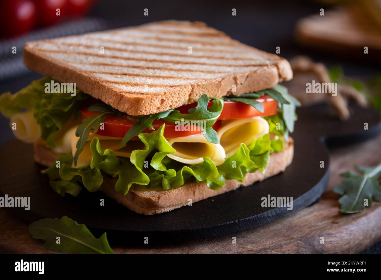 Delicious sandwich with toasted bread, lettuce, cheese and tomatoes ...