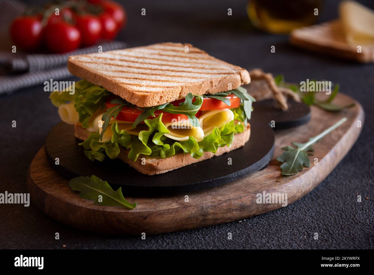 Delicious sandwich with toasted bread, lettuce, cheese and tomatoes ...
