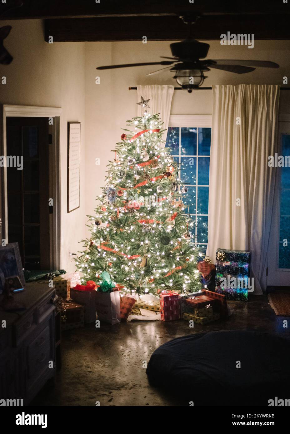 Festive moments christmas lights on tree hi-res stock photography and ...