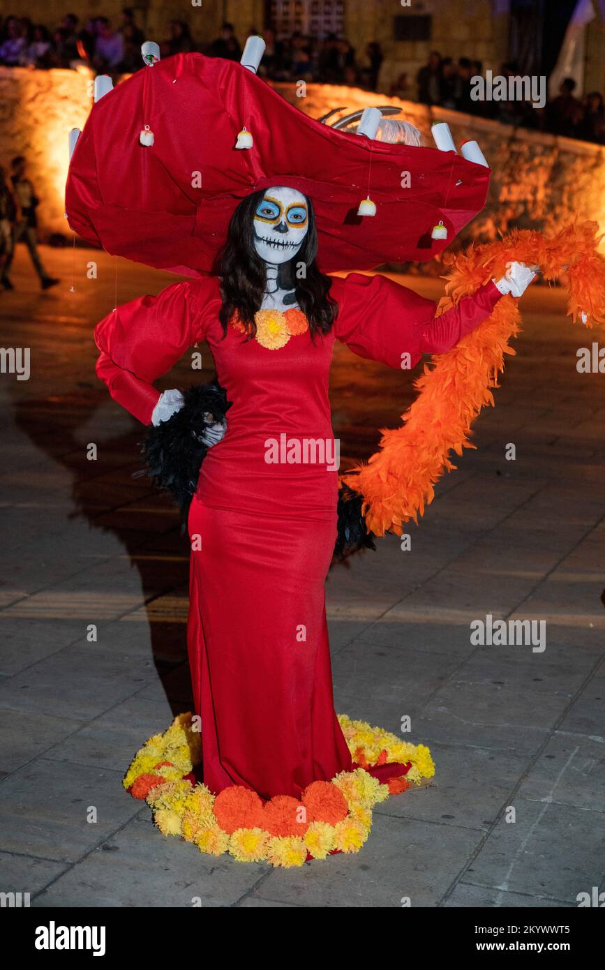 Woman with face painted & dressed as La Catrina for a costume ...