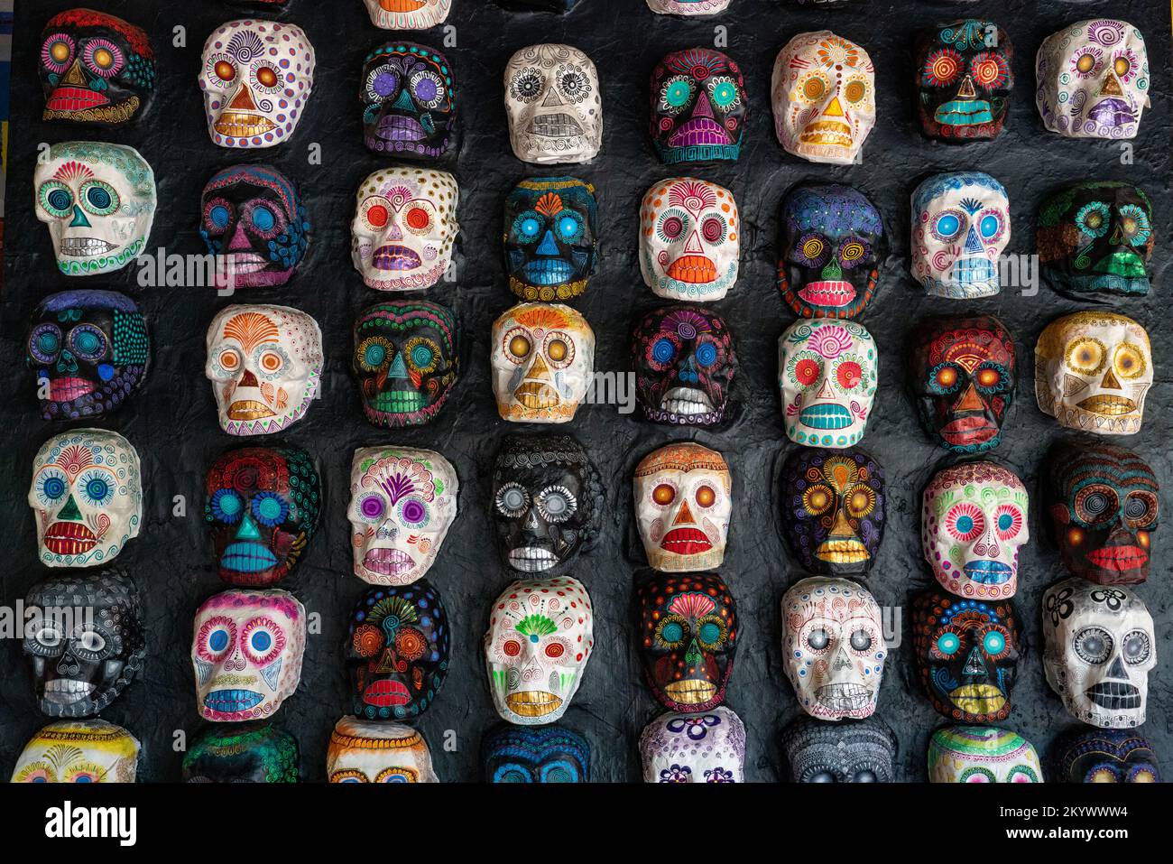 Cartoneria or papier-mache Day of the Dead masks decorating a ...