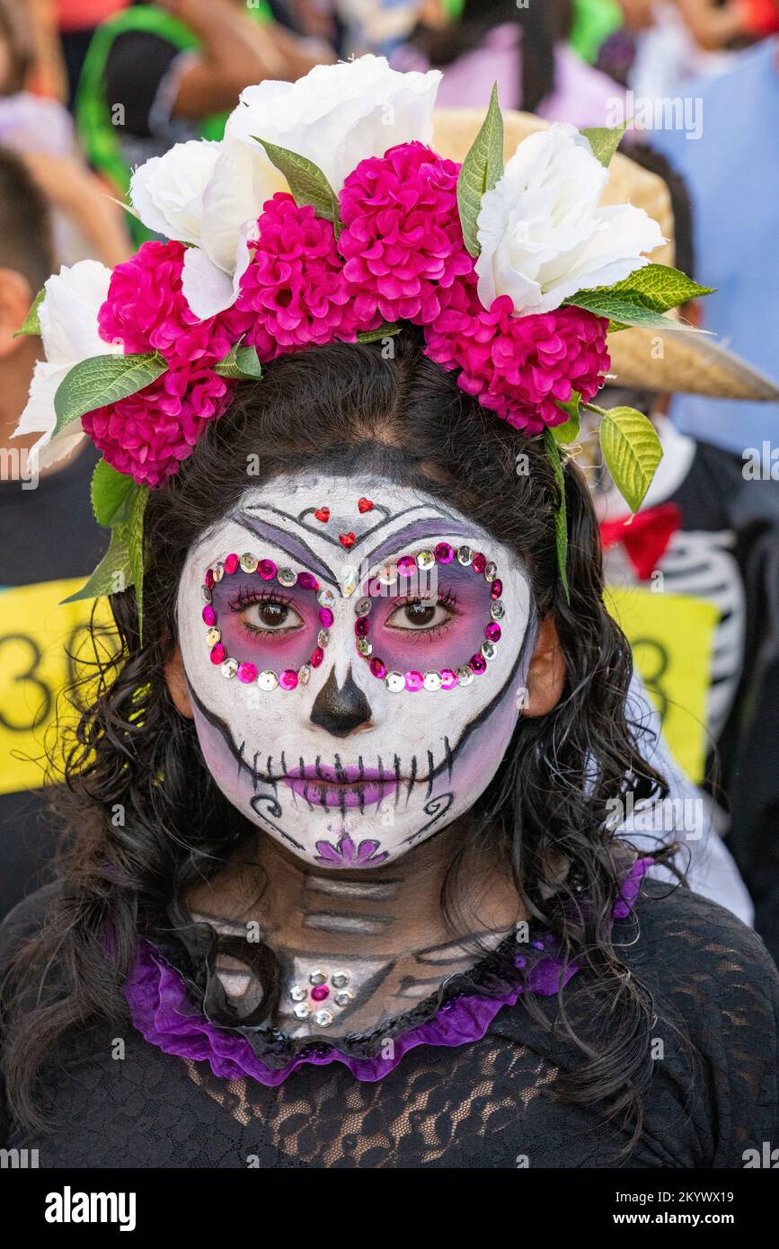 A woman with her face painted for the Day of the Dead celebration in ...