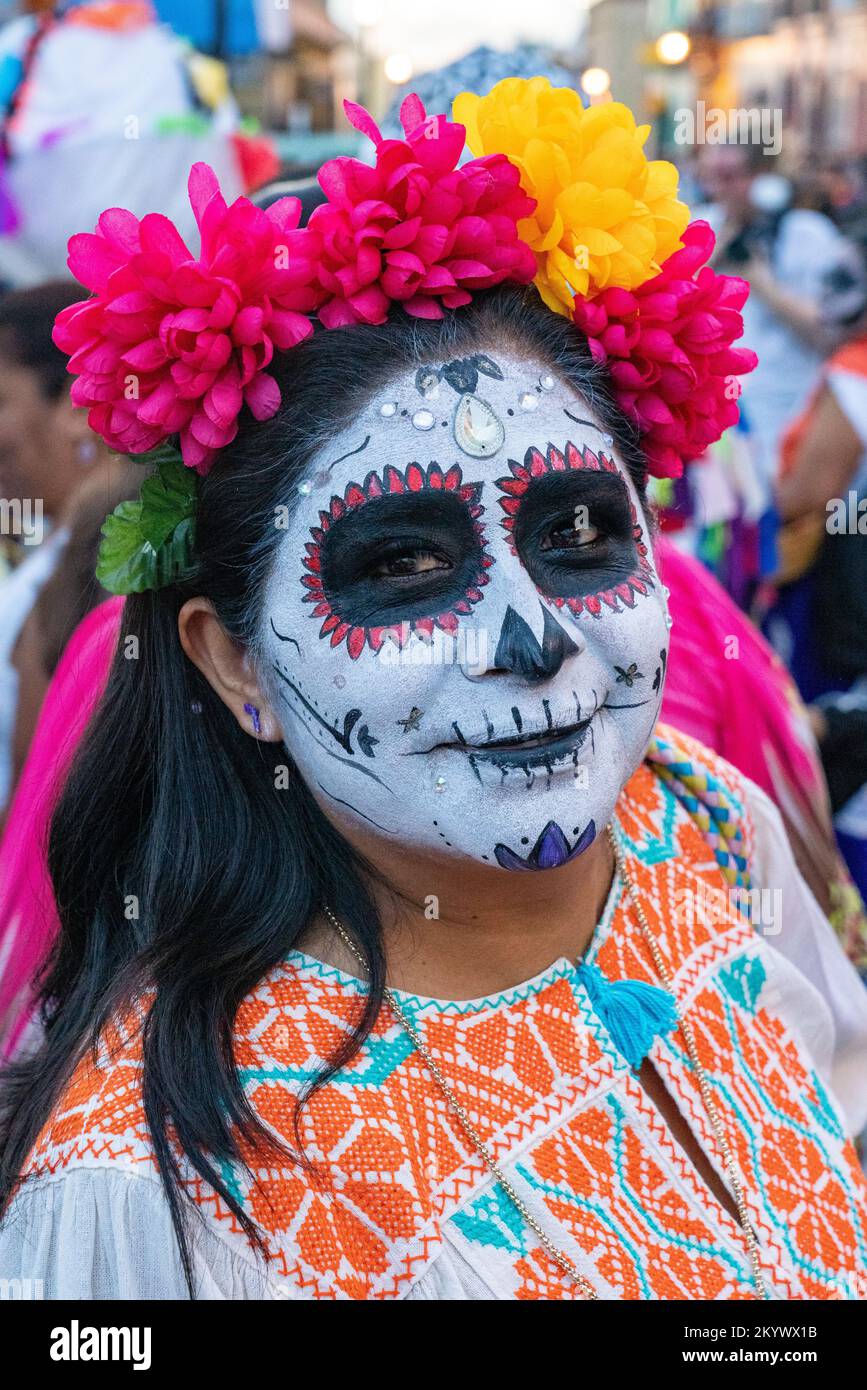 A woman with her face painted for the Day of the Dead celebration in ...