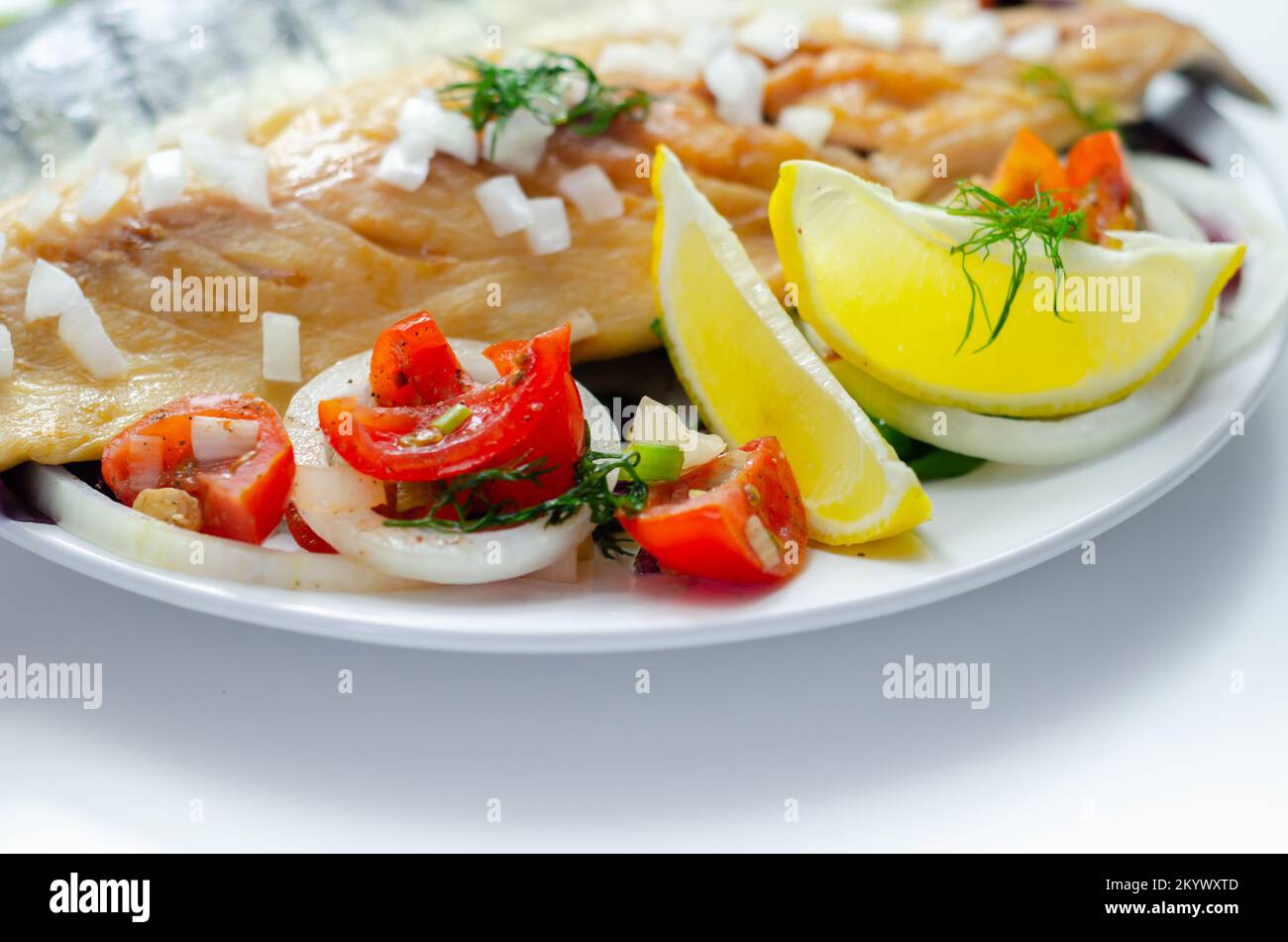 Hot smoked scottish mackerel fillets with onions, tomato and salad ...