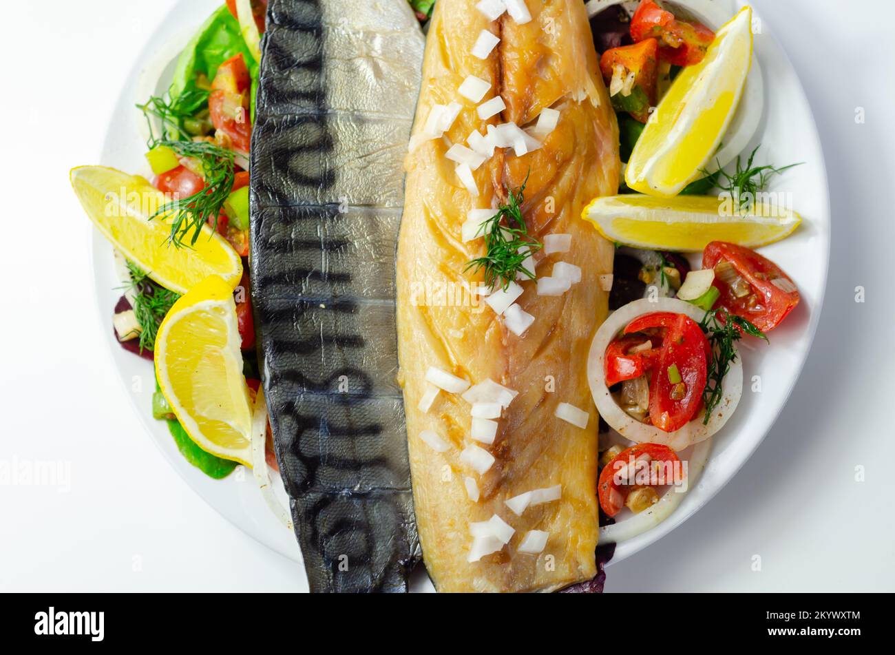 Hot smoked scottish mackerel fillets with onions, tomato and salad ...