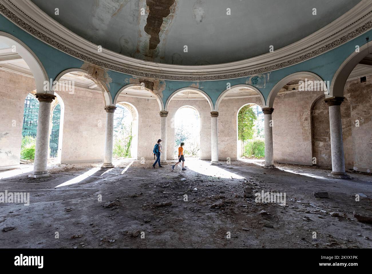Mother and son tourists exploring spectacular abandoned ex soviet ...
