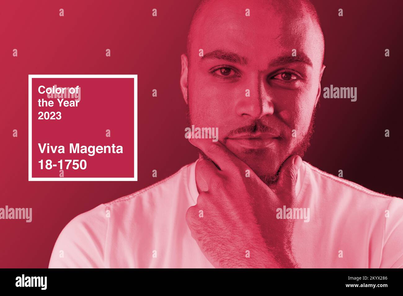 Serious thoughtful guy portrait in magenta light. Color of the year ...