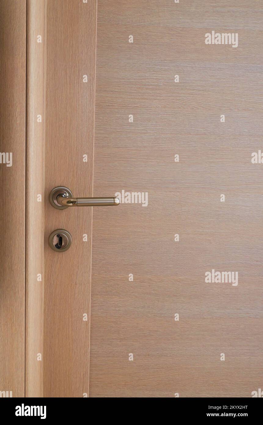 Close-up of a door in beige color - modern design Stock Photo - Alamy