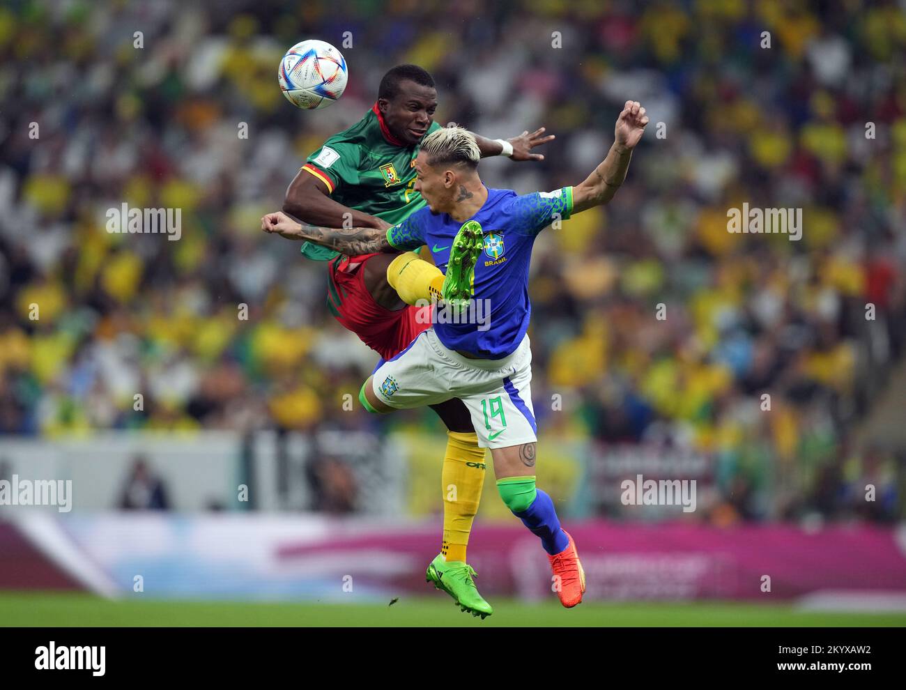 Cameroon's Tolo Nouhou and Brazil’s Antony (right) battle for the ball ...