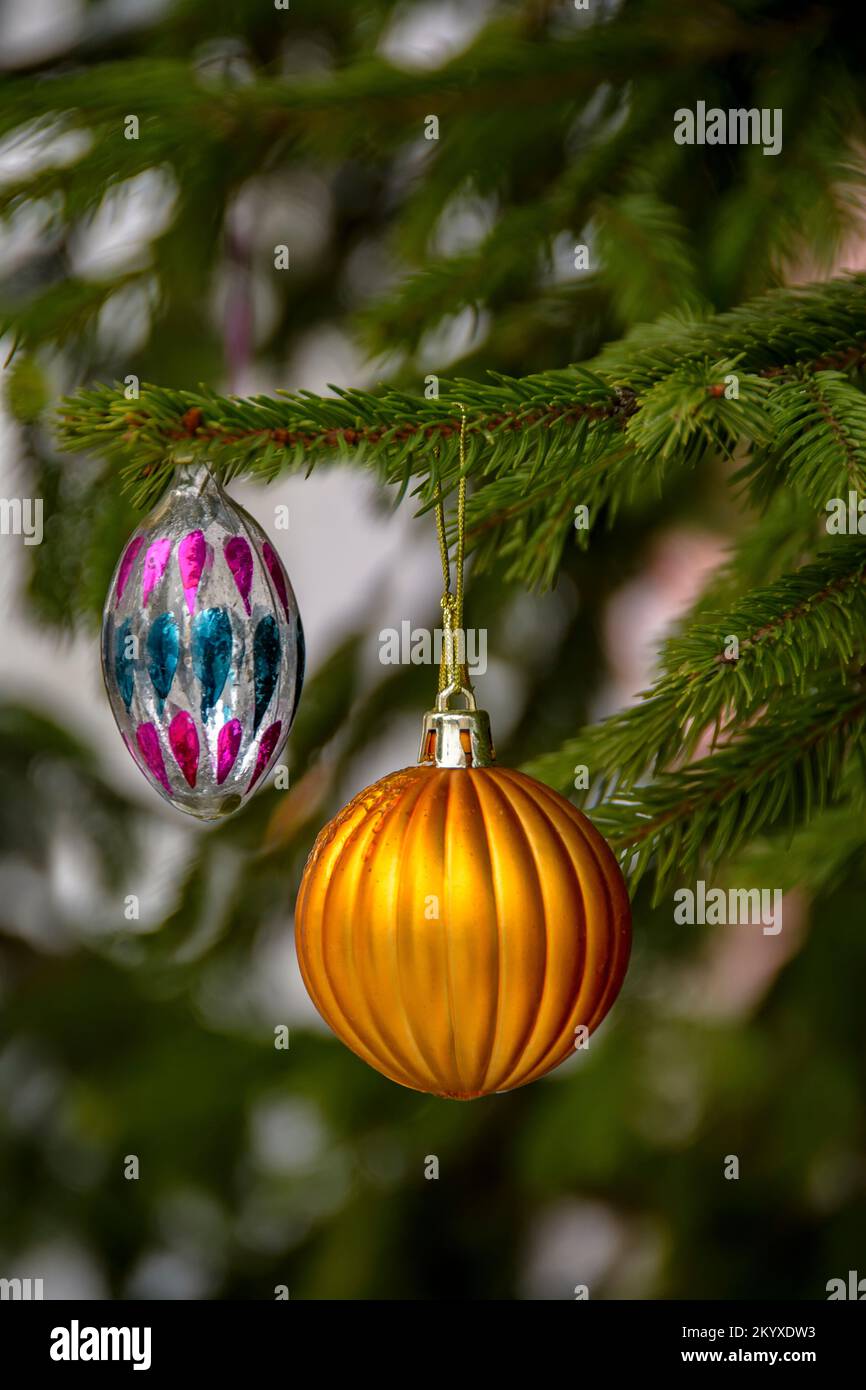 A spruce branch decorated with balls before the New Year Stock Photo ...