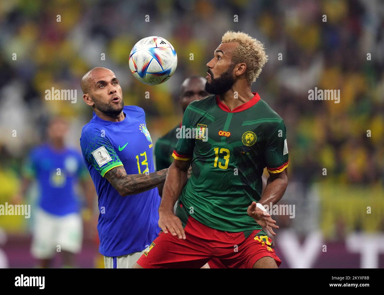 Brazil’s Dani Alves and Cameroon's Eric Maxim Choupo-Moting (right ...