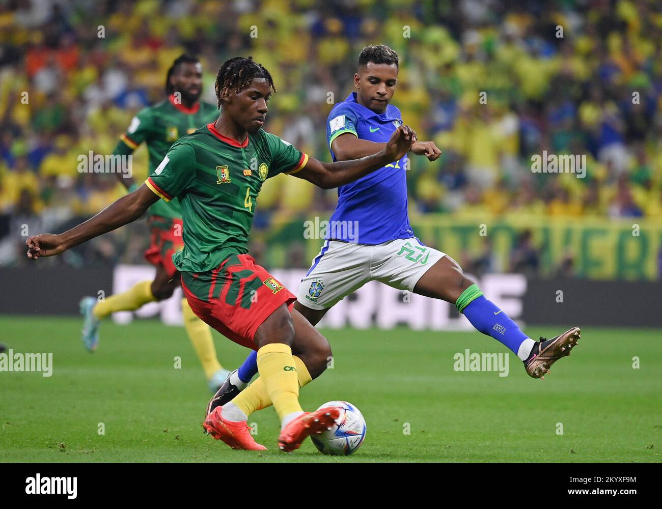 Lusail, Qatar. 2nd Dec, 2022. Christopher Wooh (L) of Cameroon shoots ...