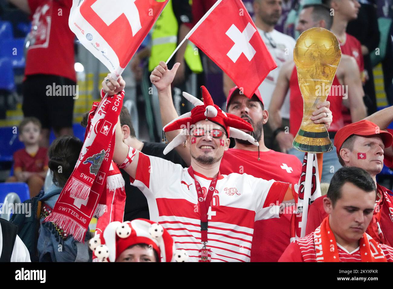 Doha, Qatar. 2nd Dec, 2022. Fans of Switzerland cheer for the team ...