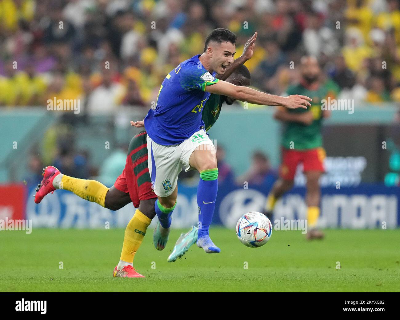 Brazil's Gabriel Martinelli loses his shoe as he is tackled by Cameroon ...