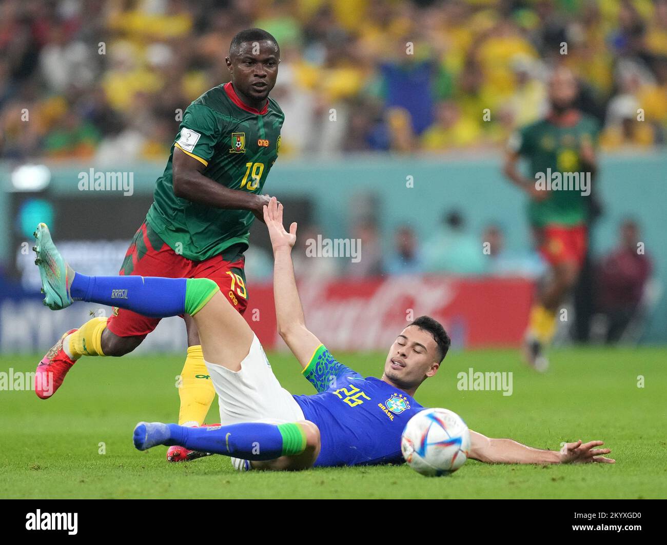 Brazil's Gabriel Martinelli loses his shoe as he is tackled by Cameroon ...