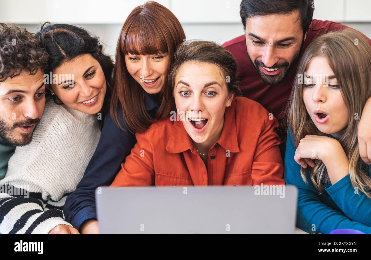 Group of digital nomad watching a new trend on internet and sharing ...