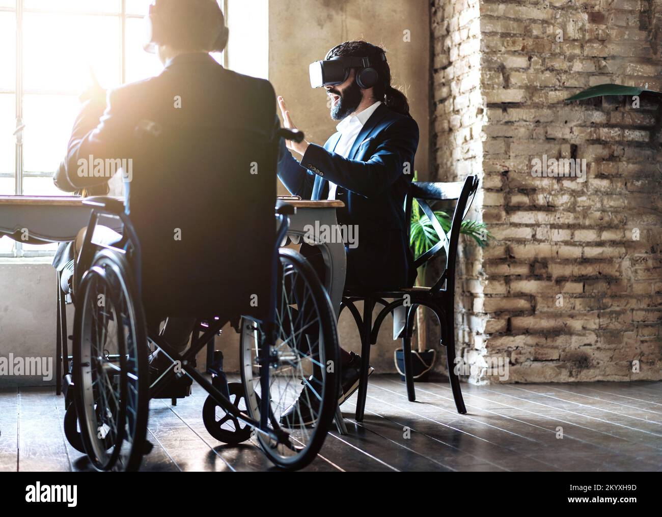African disabled businessman working with new wearable technology with ...