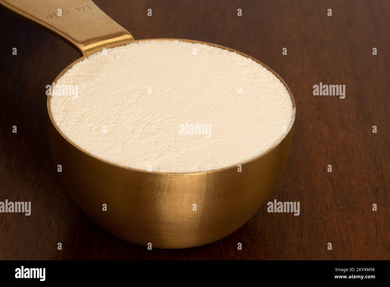 Whey Protein Powder in a Measuring Cup Stock Photo - Alamy