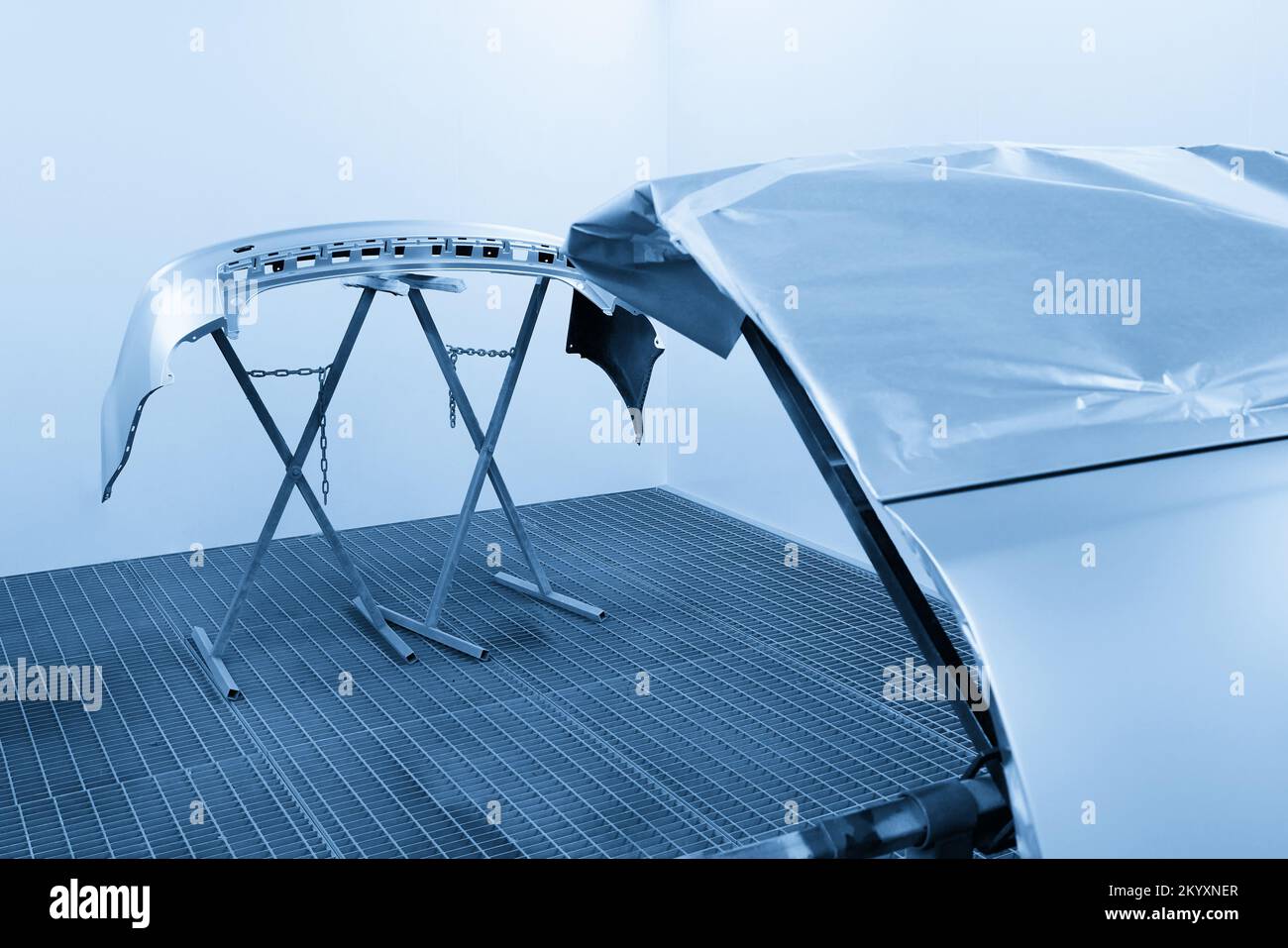 Car bumper after painting. Drying parts of the automobile in spray ...