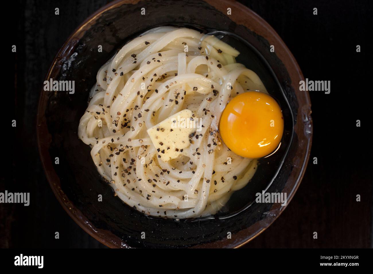 Hot udon with butter, egg, and black pepper at Bakaichidai - a ...
