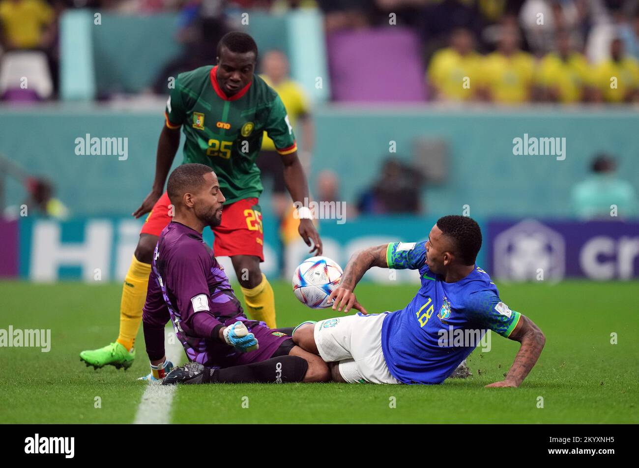 Cameroon goalkeeper Devis Epassy saves at the feet of Brazil’s Gabriel ...