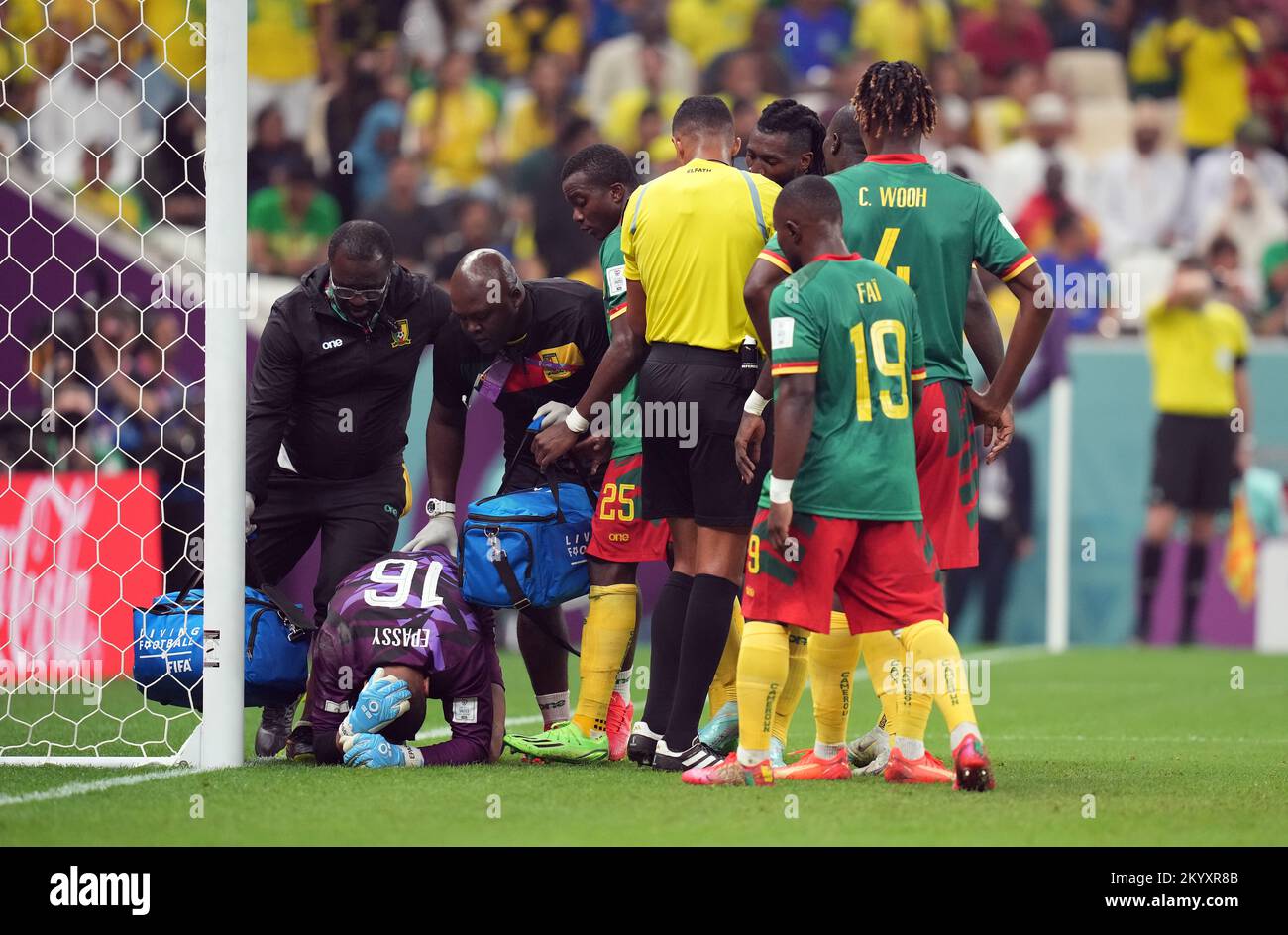 Cameroon goalkeeper Devis Epassy receives treatment during the FIFA ...