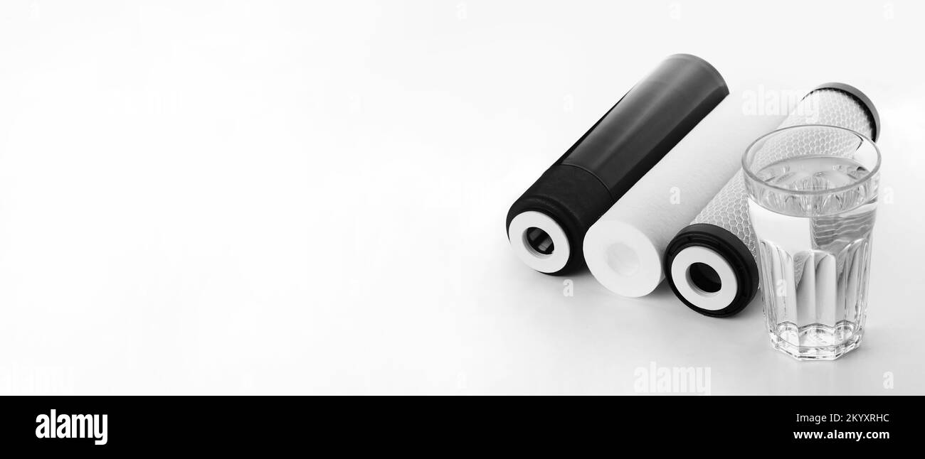 Banner of three of cartridges for water filter with clear fresh glass ...