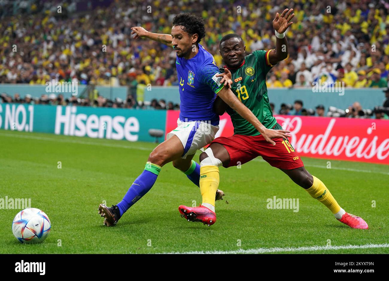 Brazil's Marquinhos (left) and Cameroon's Collins Fai battle for the ...