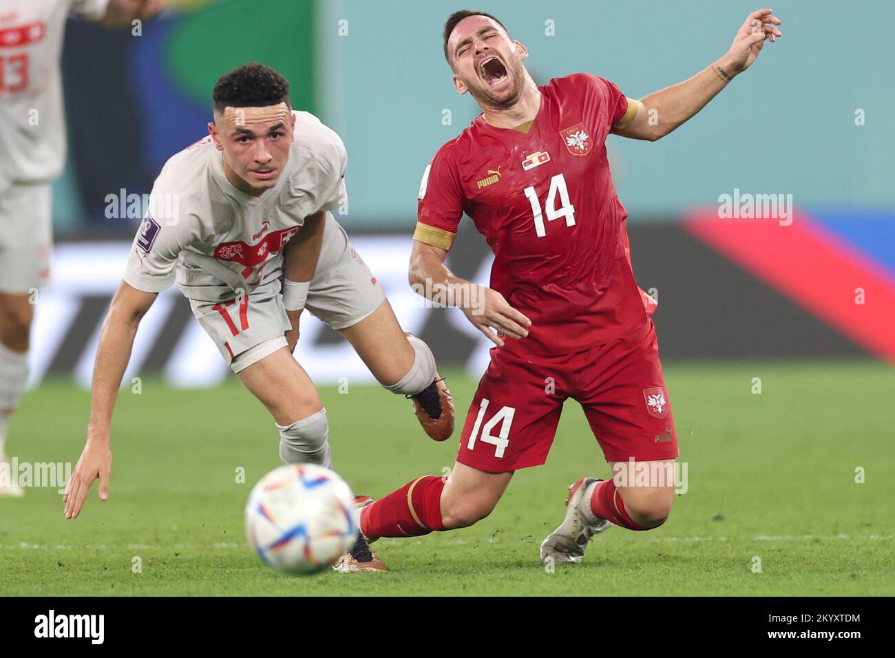 Doha, Qatar. 2nd Dec, 2022. Ruben Vargas (L) of Switzerland vies with ...