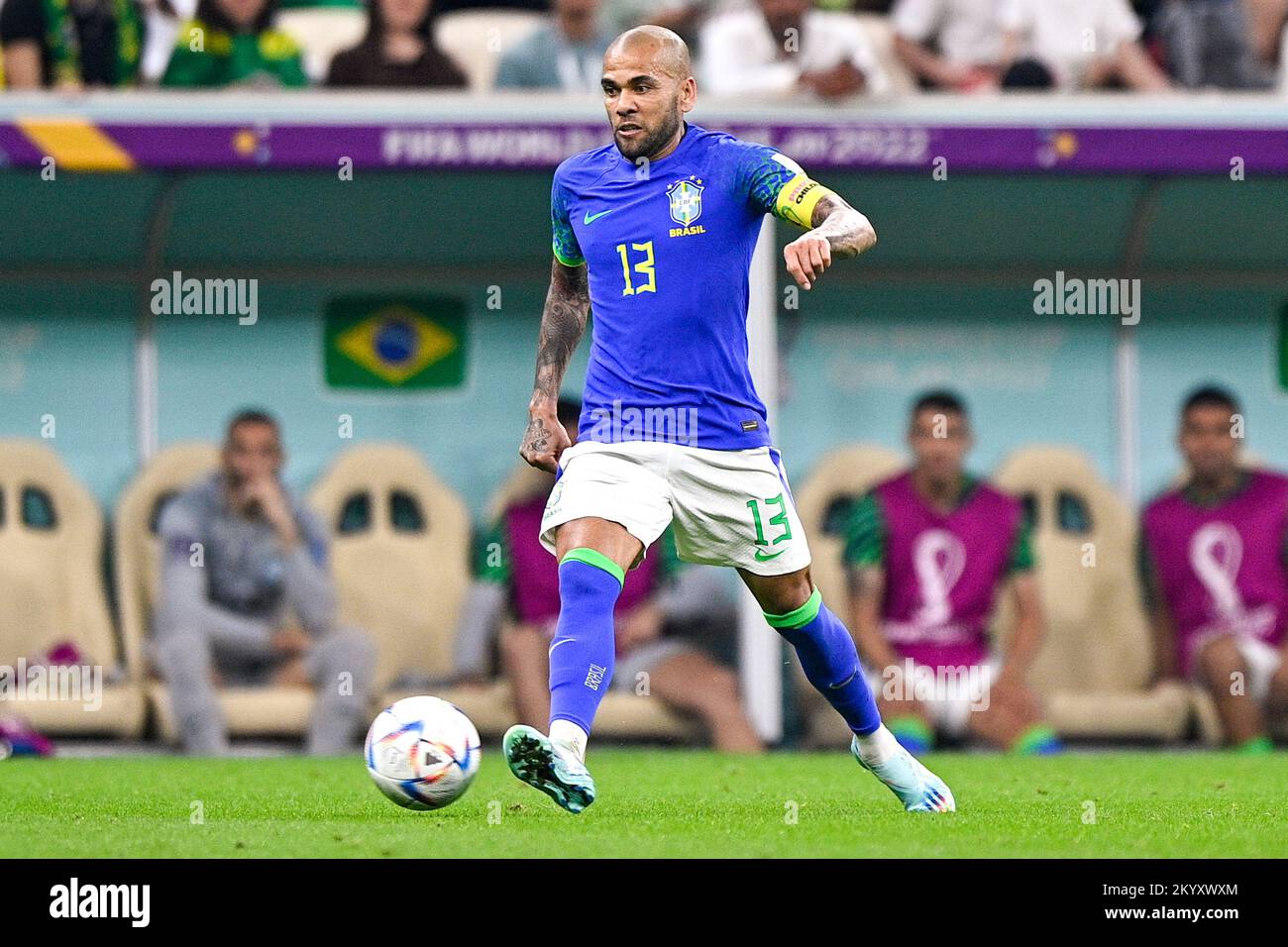 LUSAIL CITY, QATAR - DECEMBER 2: Dani Alves of Brazil runs with the ball during the Group G ...