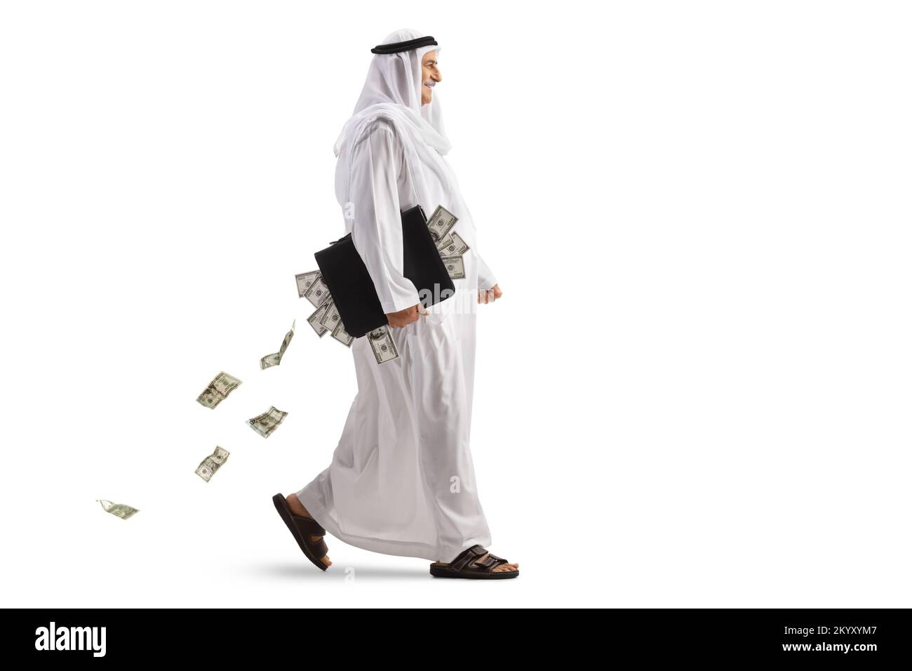 Full length profile shot of an arab man walking with a briefcase full ...