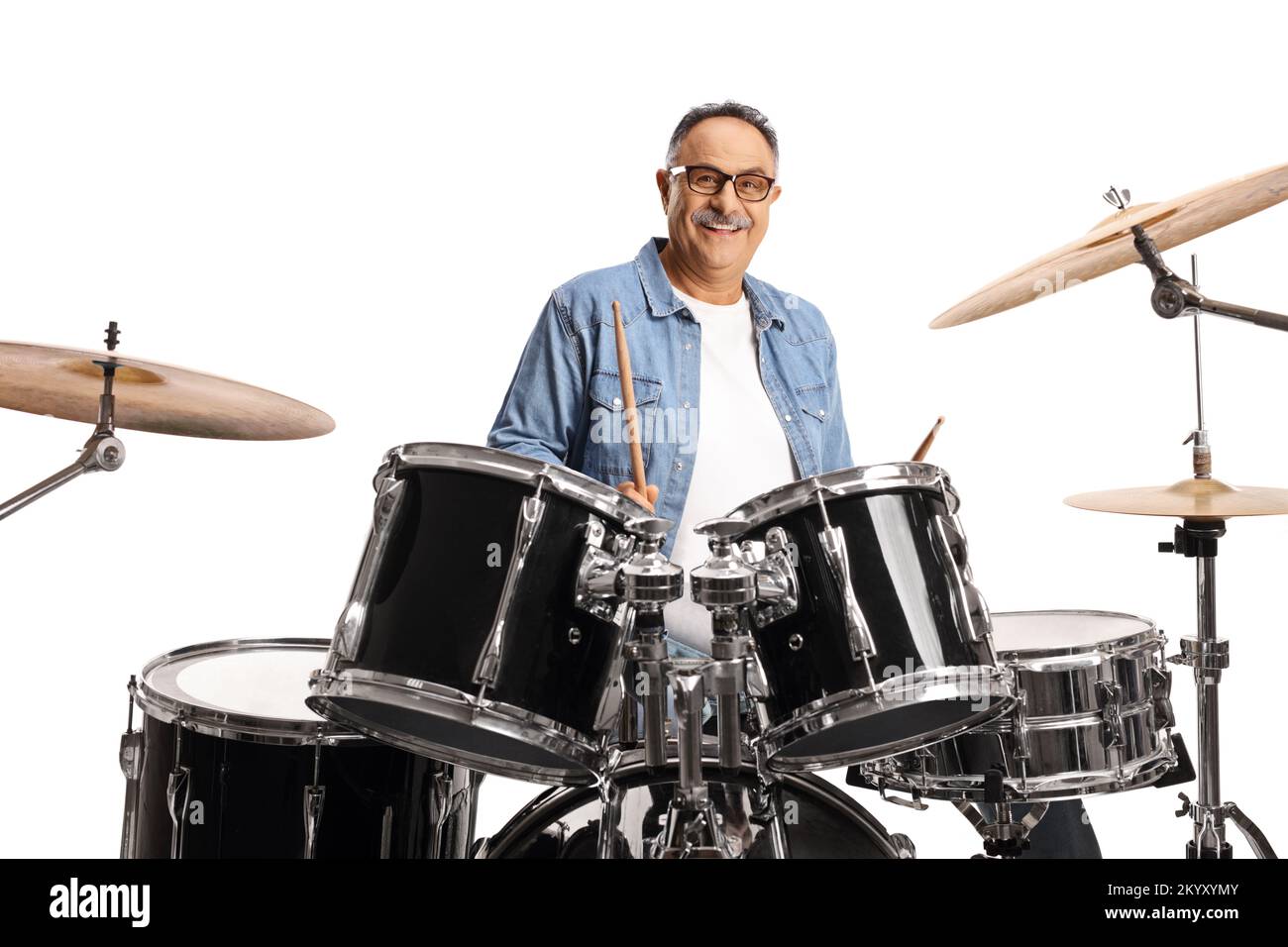 Mature man playing drums hi-res stock photography and images - Alamy