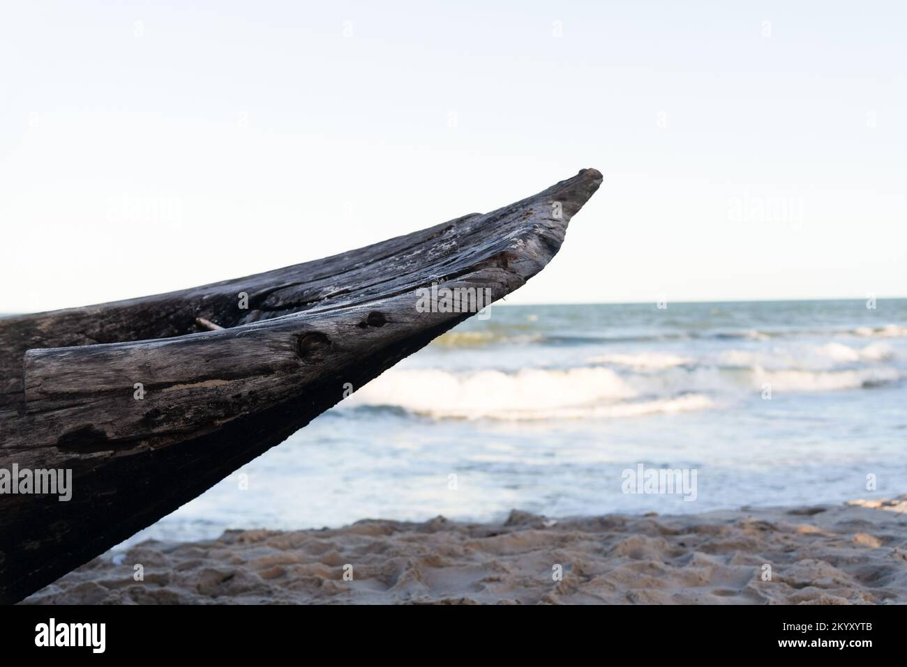 Boat on the beach sand against blue sky. City of Valenca, Brazil Stock ...