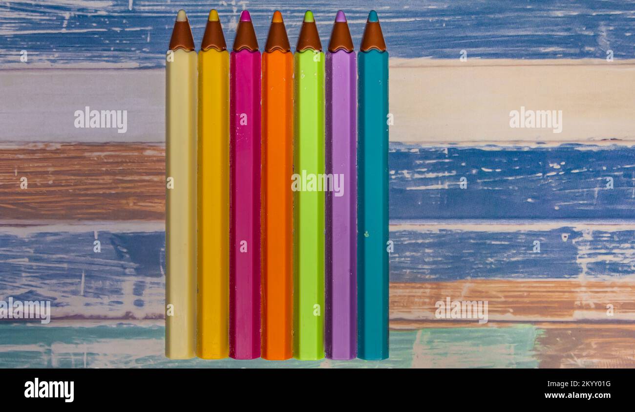 Coloured nice pencils on color table with light from above Stock Photo ...